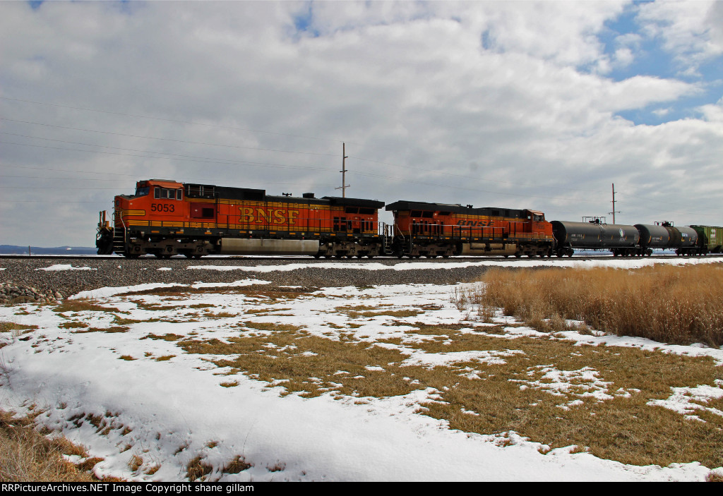BNSF 5053 Leads a Slow freight into Town.